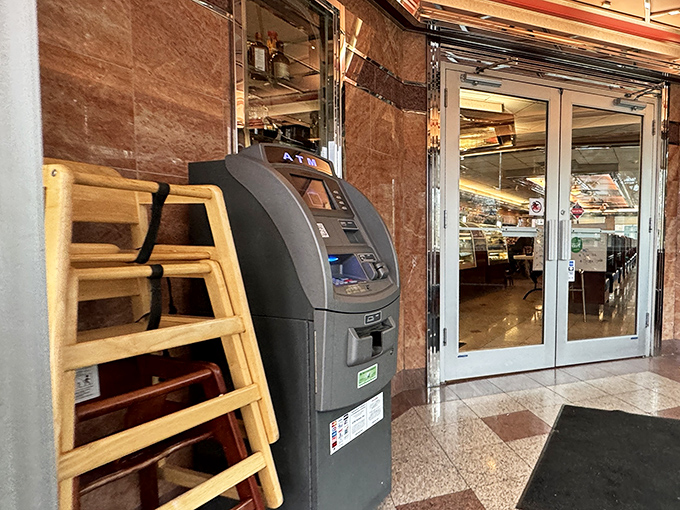 Even the ATM looks at home in this temple of traditional dining. Cash in hand means more French onion soup for everyone.