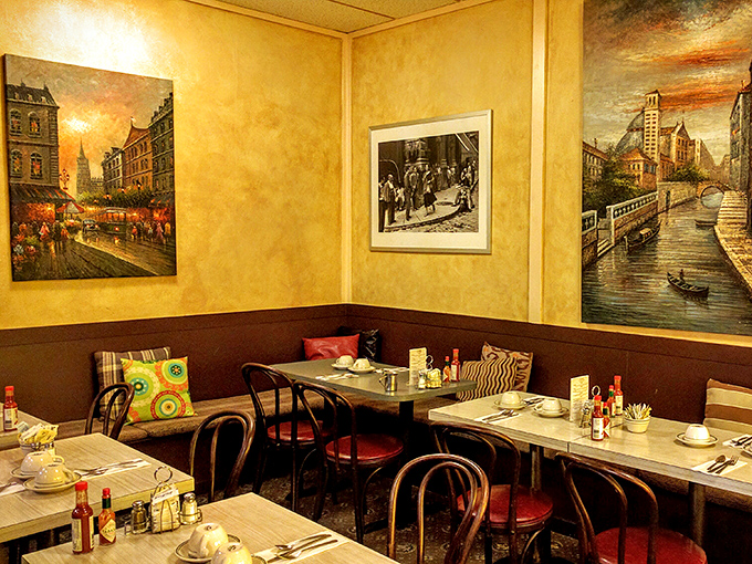 The back dining room's art and warm tones create a cozy breakfast sanctuary away from the city's famous fog.