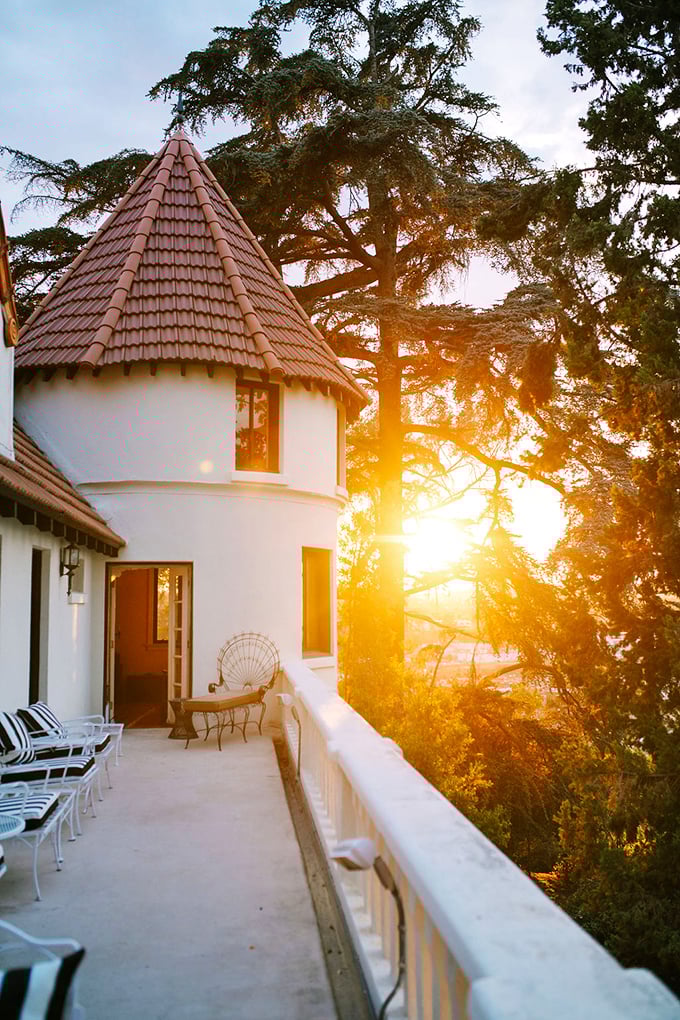 Sunset from the castle turret balcony&mdash;nature's own light show that makes even the most jaded Californian pause their scrolling to appreciate real-life magic.