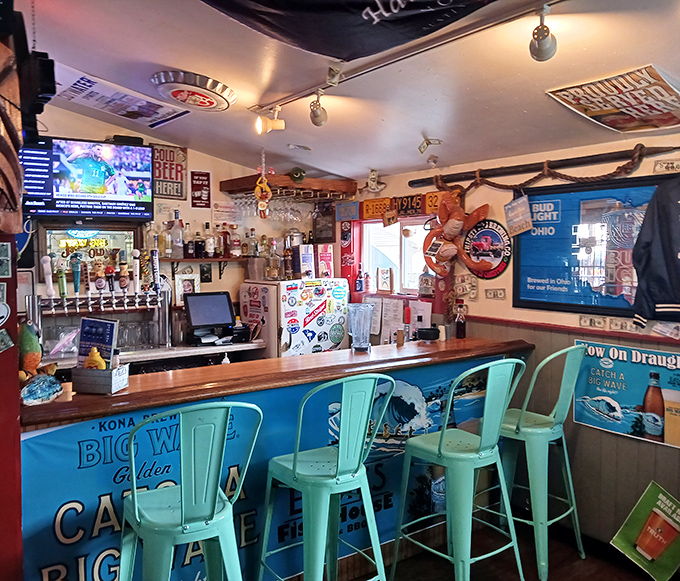 The bar area's bright turquoise stools and nautical-themed decor transport you to a coastal getaway, even when you're firmly planted in North Canton.