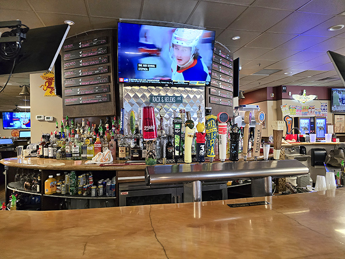 Behind the bar, an impressive lineup of spirits stands ready for duty, like a liquid library waiting to tell its stories.