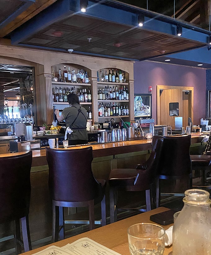 The well-stocked bar isn't just serving drinks&mdash;it's dispensing liquid courage to try that extra-spicy &eacute;touff&eacute;e.