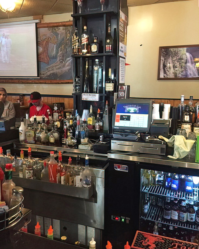 A bar stocked for every celebration or commiseration. Whether toasting success or drowning sorrows, this lineup of bottles stands ready for duty.