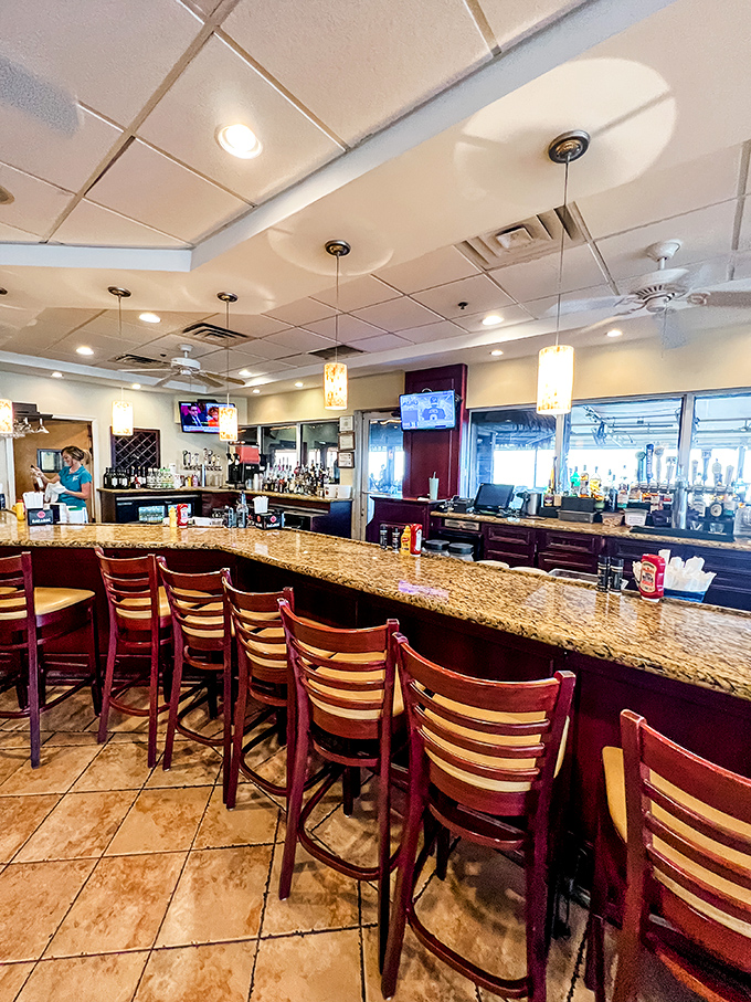 The bar at Shuckers&mdash;where locals and visitors alike find common ground over cold drinks and the promise of fresh seafood.