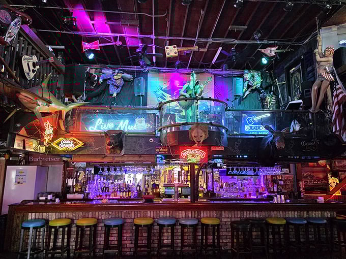 The bar at Lou's Blues isn't just serving drinks &ndash; it's serving stories, music, and the kind of neon-lit atmosphere that makes memories.