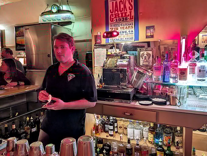 Friendly bartender ready to craft the perfect cocktail companion for your upcoming steak dinner adventure.