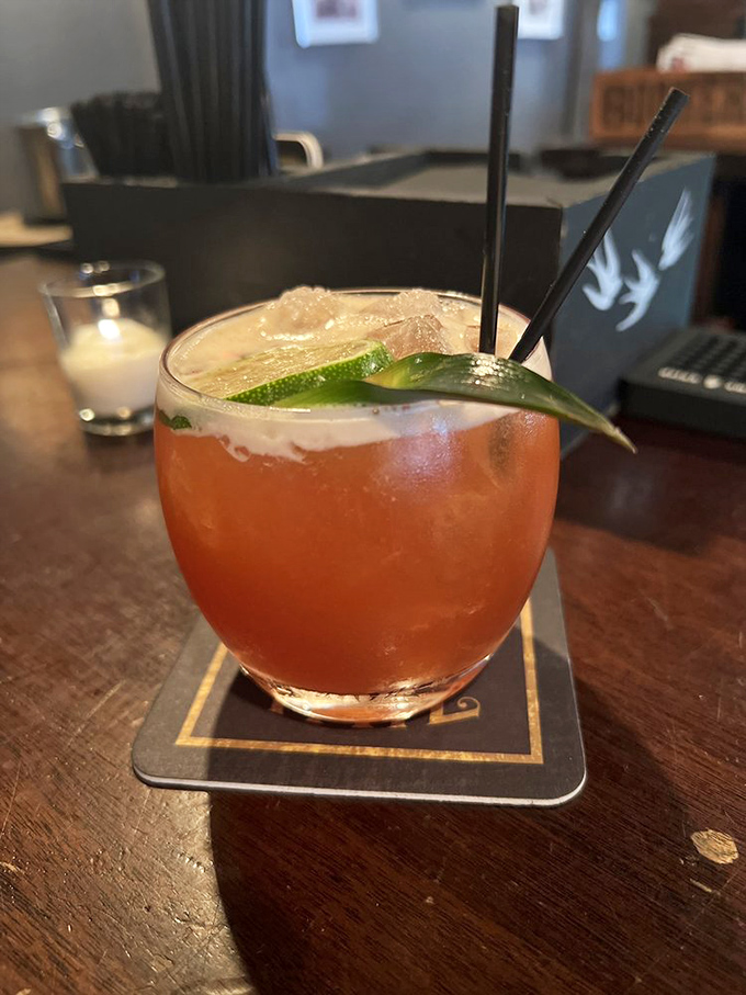 A cocktail so photogenic it deserves its own Instagram account. That ruby-red hue promises flavor adventures your taste buds have been dreaming about.