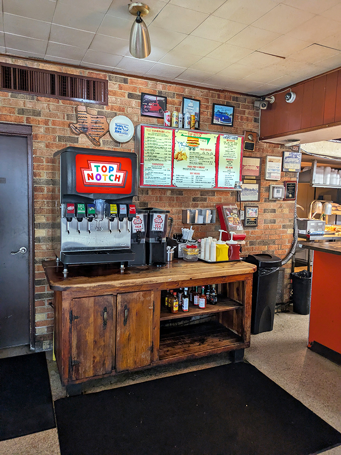The soda fountain station—where decisions about which fizzy companion will best complement your burger become surprisingly important life choices.