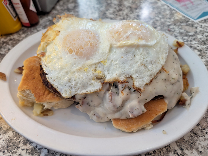 Biscuits and gravy topped with a sunny-side-up egg&mdash;the breakfast equivalent of a warm hug from your favorite grandparent.