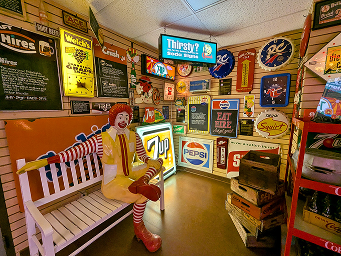 Ronald McDonald lounges casually on a bench, surrounded by vintage soda signs&mdash;a surreal break room for advertising icons on their day off.