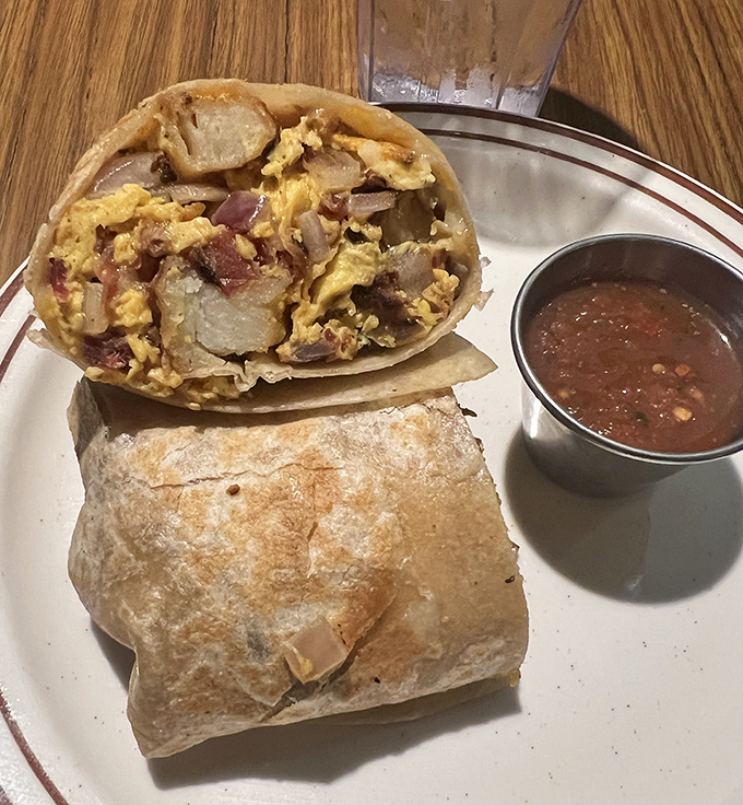 Breakfast burritos: where eggs, potatoes, and morning dreams are wrapped in a tortilla blanket and served with a side of happiness.