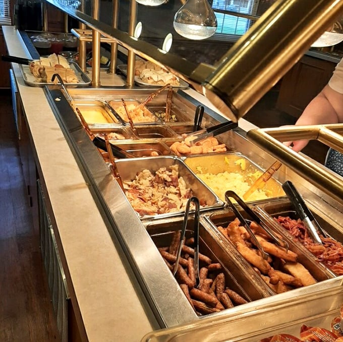 Buffet heaven where steam rises from dishes that define what comfort food should truly be.