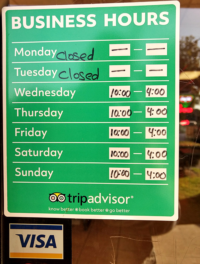 The business hours sign – a treasure map to smoked meat nirvana. Plan accordingly or face the crushing disappointment of "closed" on Mondays.