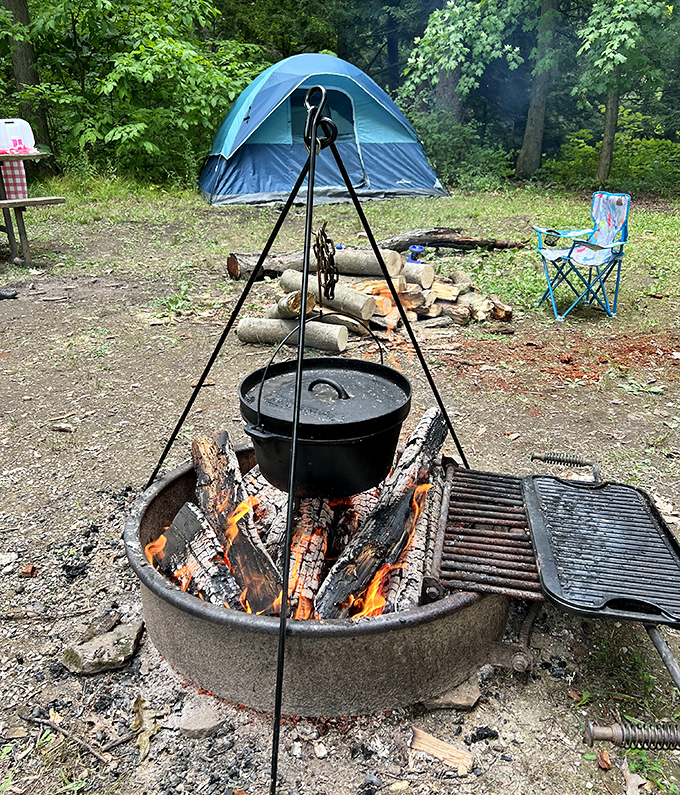 Campfire cooking doesn't get more authentic than this&mdash;a cast iron pot suspended over flames, promising meals that taste like adventure.