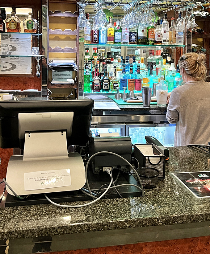 Behind every great diner is a well-stocked bar. This illuminated display of spirits promises cocktails that could turn lunch into an accidental afternoon nap.