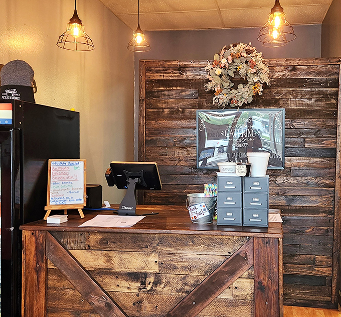 The ordering counter: where dreams come true and diets go to die. That rustic wood paneling has heard thousands of "mmms" and "wows."