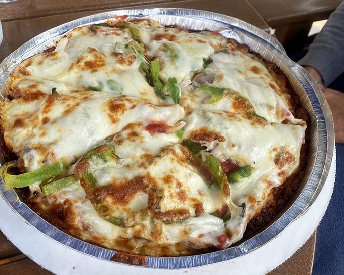 Pizza perfection doesn't discriminate&mdash;this cauliflower crust pie proves that delicious knows no boundaries. Those green peppers add just the right crunch.