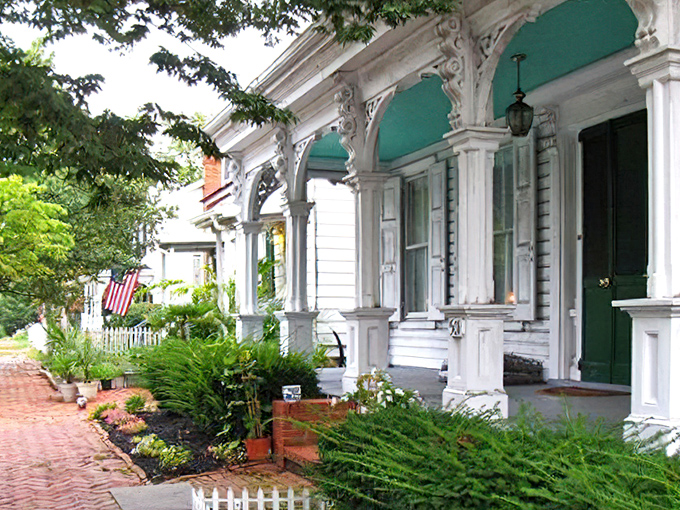 Victorian-era homes showcase elaborate woodwork and welcoming porches, where summer evenings still invite neighborly conversations.