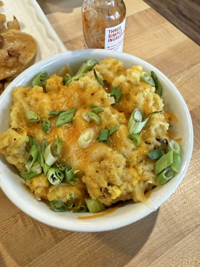 Not your grandmother's grits (unless she was a culinary genius). Cheesy, spicy, and topped with scallions&mdash;Southern comfort with Pennsylvania flair.