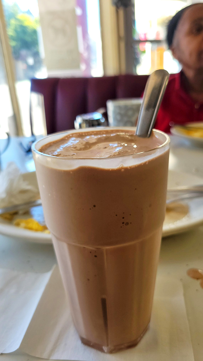 This chocolate shake isn't just a beverage &ndash; it's a time machine back to when diners ruled and straws were built to handle serious milkshake business.