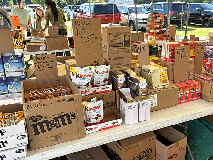 Candy and chocolate boxes stacked high, proving some deals are literally sweet.