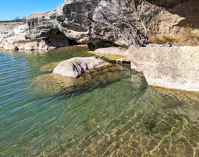 Clarity you can count on! The transparent waters of Pedernales reveal a kaleidoscope of smooth stones beneath the surface.