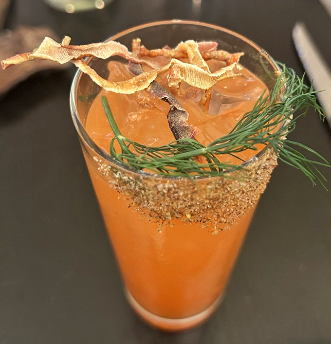 This isn't just a cocktail; it's performance art in a glass, with garnishes that deserve their own Instagram account.