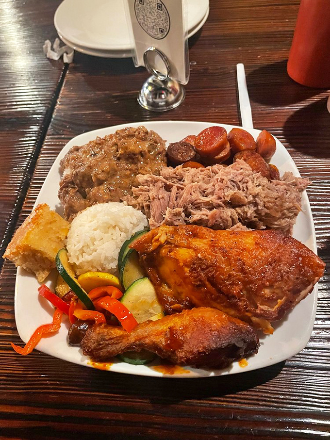 The sampler plate that solves all decision-making anxiety&mdash;a little of everything means you don't have to choose between coconut beef, chicken, and pulled pork.