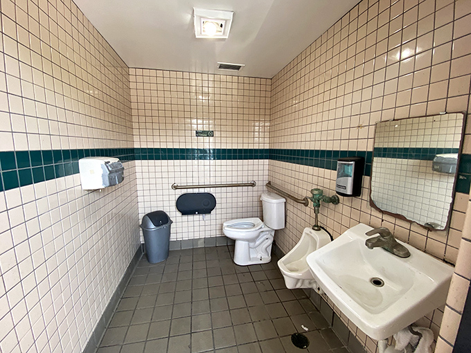 Even the restroom speaks to a bygone era when tile was tile, fixtures were sturdy, and hand-washing was non-negotiable before diving into finger food.