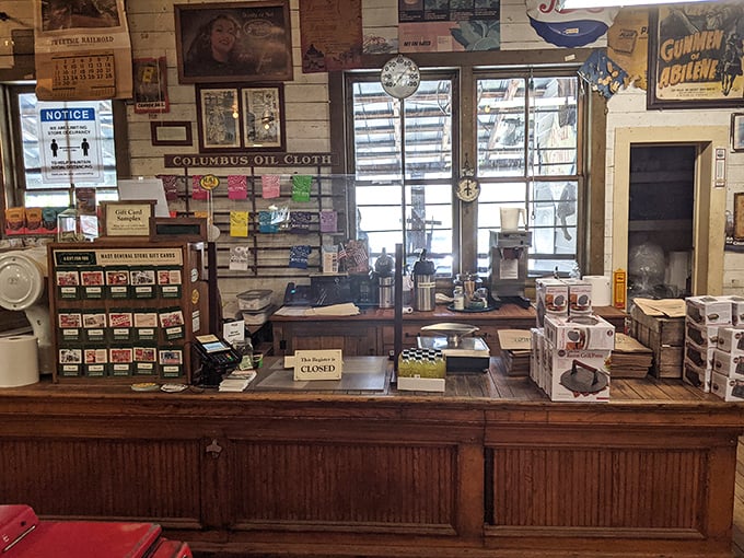The worn wooden counter has heard more local news than any Facebook feed, with each scratch and dent recording a transaction, a conversation, a moment in time.
