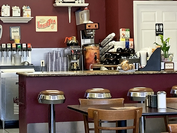 The counter seating—where solo diners become regulars and the coffee flows like conversation between newfound friends.
