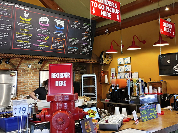 Behind every great BBQ joint is an ordering system that gets hot food to hungry people. The red fire hydrant is a fitting symbol for food this fire.