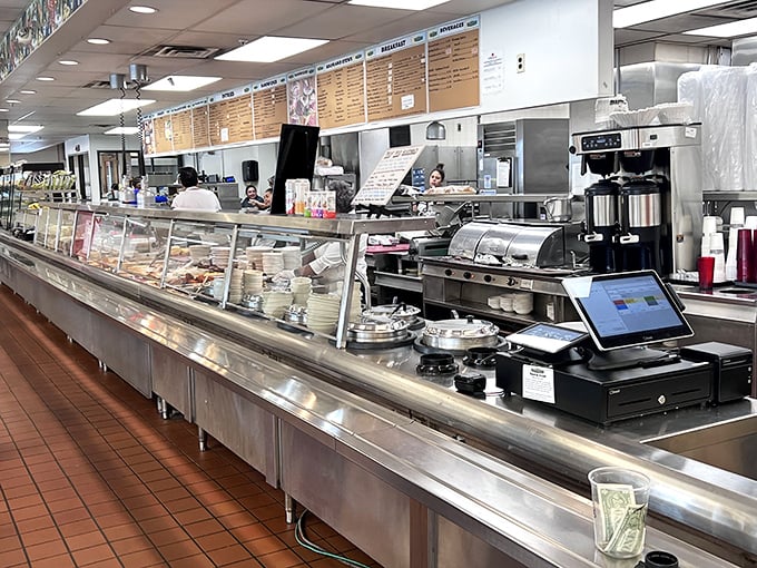 Behind this counter, deli magic happens daily&mdash;meats sliced to order, salads scooped with generous hands, and sandwiches assembled with architectural precision.