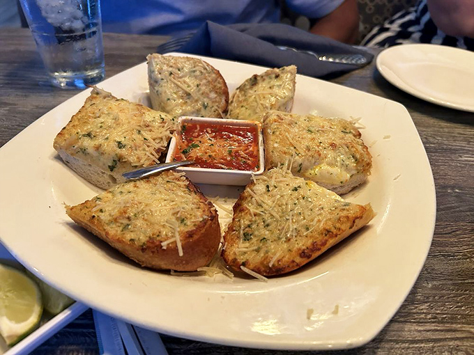 Crab-topped bread that answers the eternal question: "How do we make bread even better?" The answer is clearly "add crab."