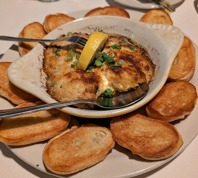 This bubbling crab dip surrounded by toasted bread is the kind of shareable starter that rarely makes it back to the kitchen.