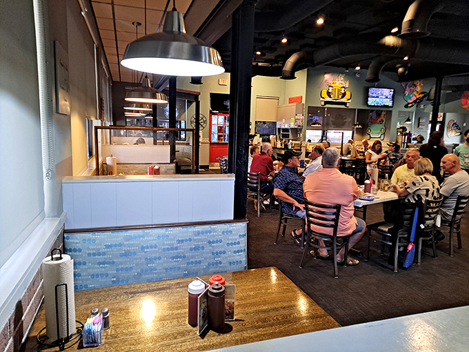 Where locals gather to debate important matters like whether the hush puppies or the boom-boom shrimp deserves top billing on your plate.