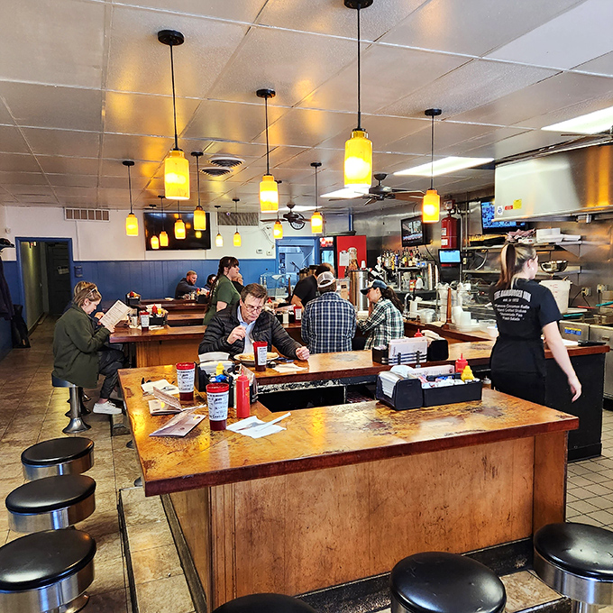 Where strangers become neighbors and neighbors become friends &ndash; the communal counter experience that defines diner culture.
