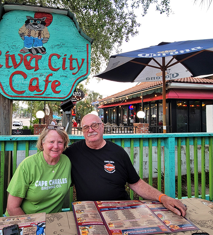 Happy diners enjoying the authentic River City experience. Those smiles say everything words can't about burger satisfaction.