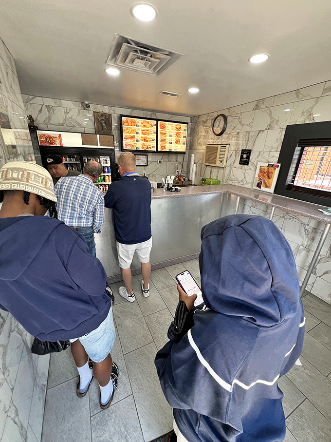 The line forms at Kitty's counter, where patience is rewarded with sandwiches worth waiting for. No reservations, no problem.