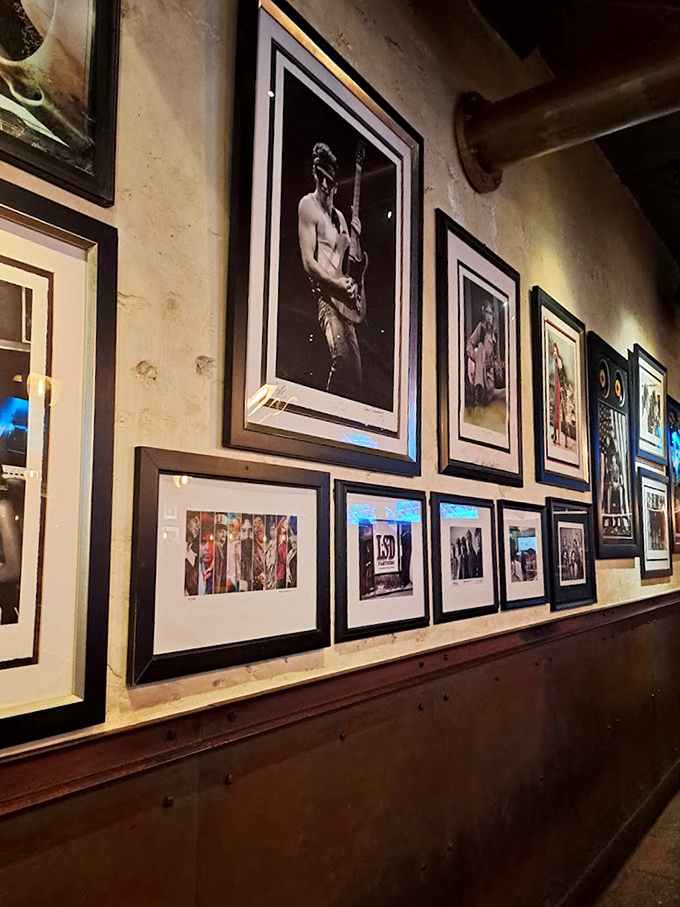 Wall-mounted photographs tell stories of musical legends, creating an atmosphere where food and culture dance together harmoniously.