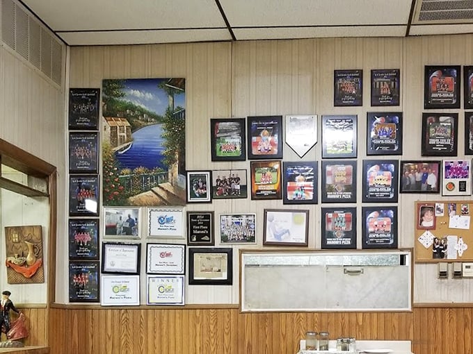 The wall of local sports memorabilia and community awards tells the story of a place that's more than a restaurant&mdash;it's a neighborhood cornerstone.