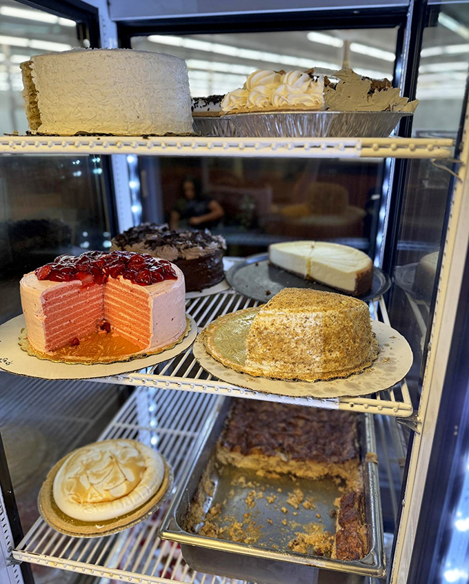 The dessert case &ndash; a glass-fronted museum of edible art where cakes and pies wait patiently for their moment of glory.