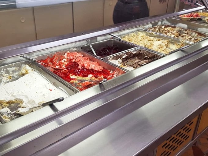 The dessert section—where even the strongest willpower crumbles faster than the cobblers they're serving.