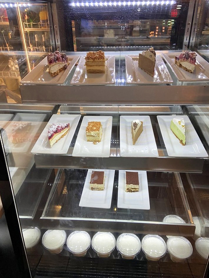 The dessert case showcases a tempting array of sweet finales&mdash;each slice promising the perfect ending to your North African feast.