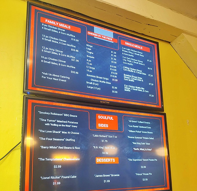 The digital menu board showcases family meals and "soulful sides," a roadmap to happiness for hungry travelers and locals alike.