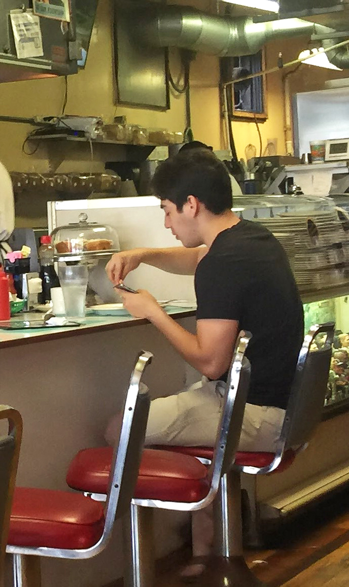 Concentration meets creation. The quiet artistry of diner cooking happens without fanfare, resulting in plates that inspire devotion.