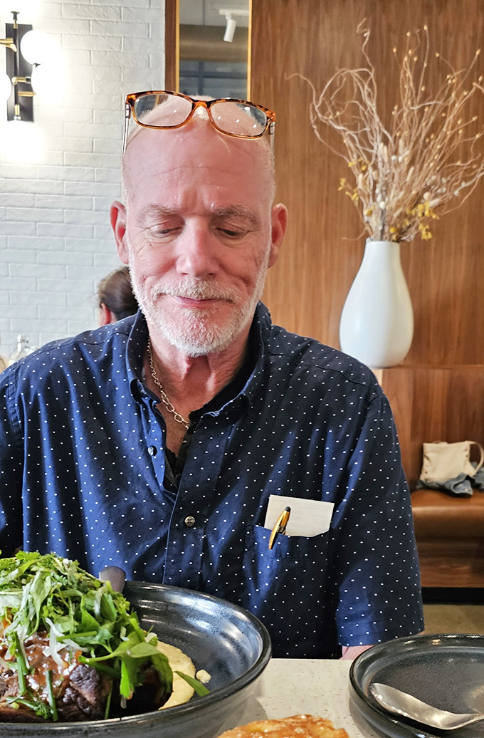 The look of someone experiencing Speck's cuisine for the first time&mdash;a moment of culinary revelation worth framing.
