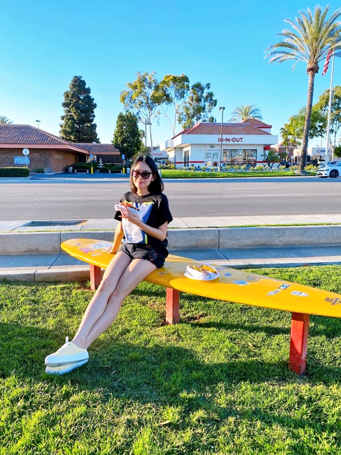 Outdoor dining with a side of people-watching&mdash;the bench is just a bonus feature of the PCH experience.