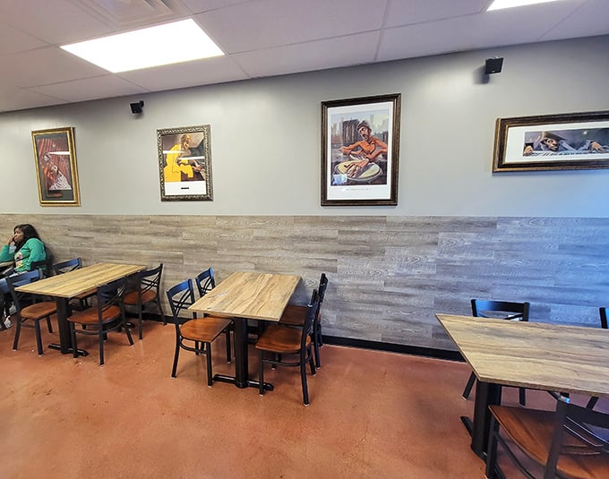 Wooden tables await their next guests in a dining room where conversations flow as freely as the sweet tea.