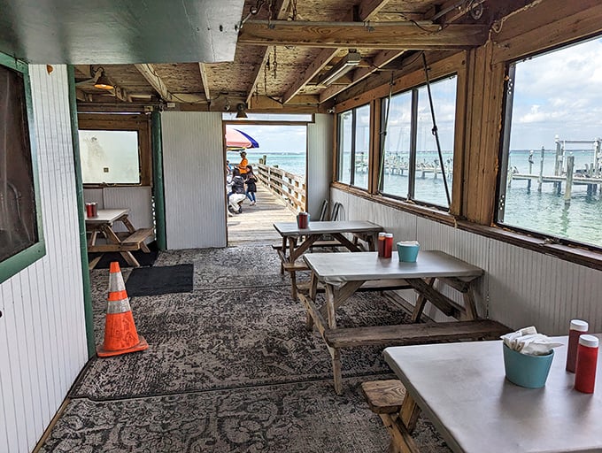 Dining with a view that makes you forget you're sitting at a picnic table. The Gulf of Mexico doesn't just provide the food&mdash;it's the entertainment.